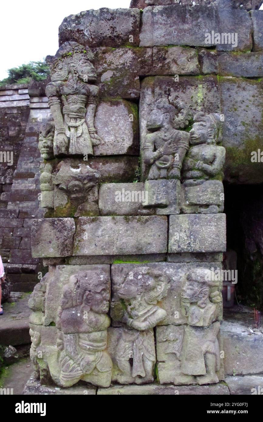 Bas-relief sculptures on wall at encased foot of Sukuh Temple, ancient ...