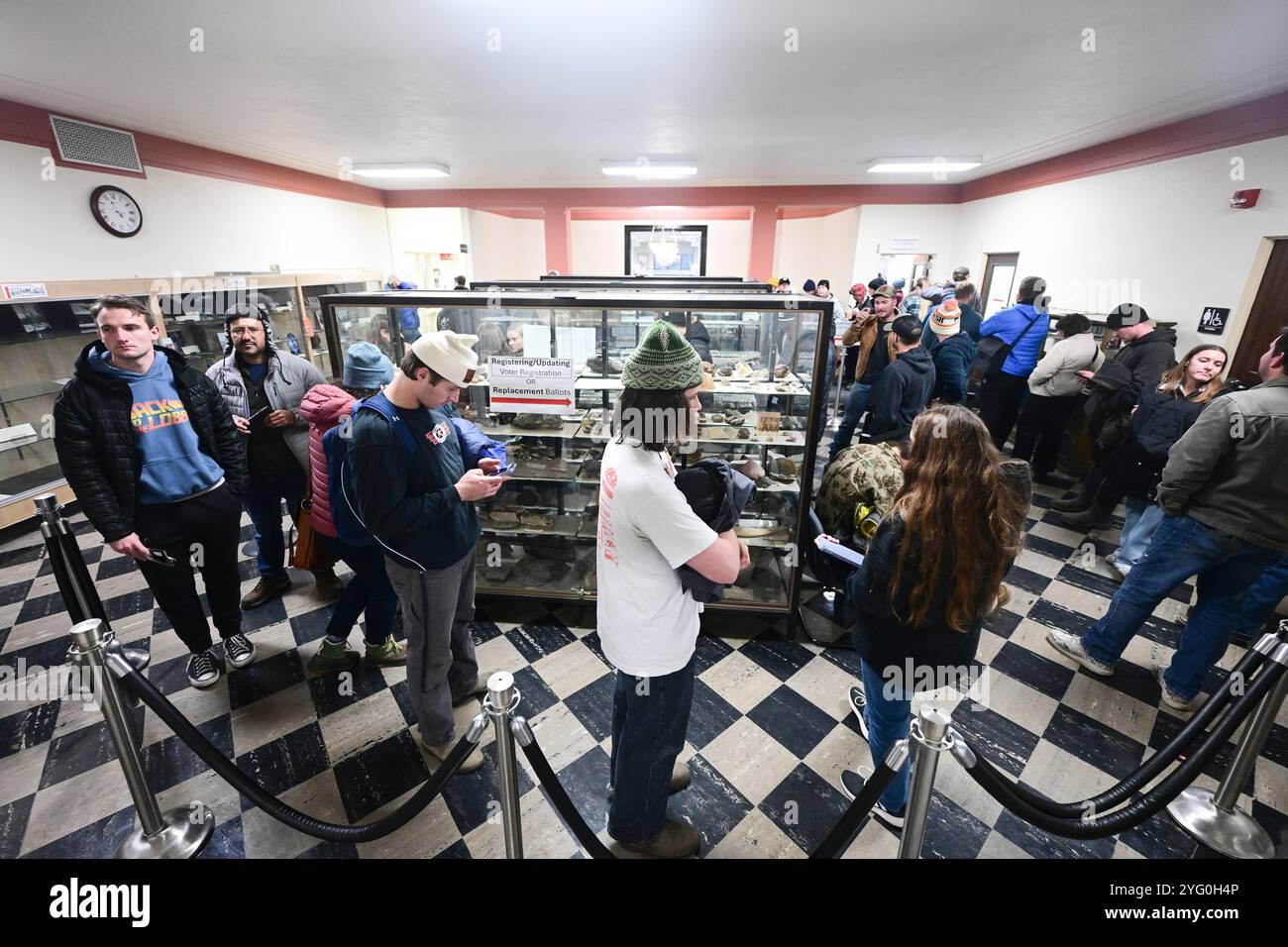 Voters line up inside the Gallatin County Courthouse in Bozeman, Mont ...