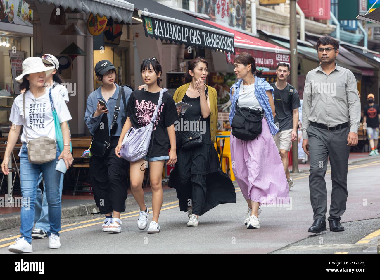 Style Japanese women wandering along Sagon street, diverse group of ...