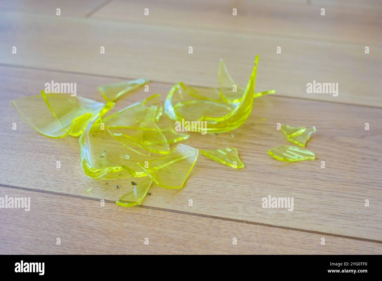 Breaking of a glass on a floor Stock Photo - Alamy