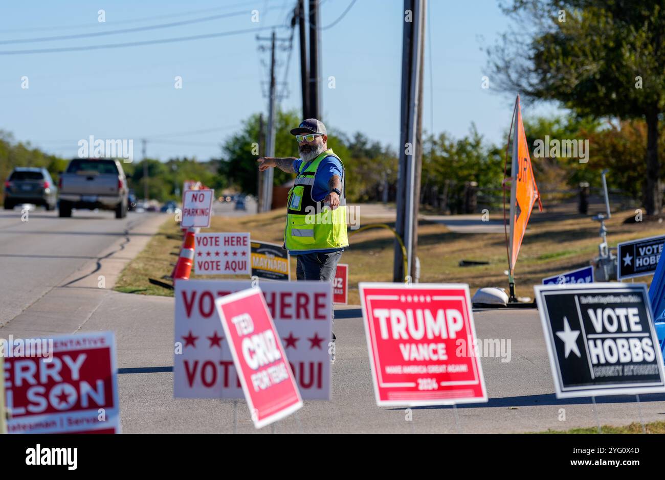 November 5, 2024, Austin, Texas, USA: An election worker directs ...