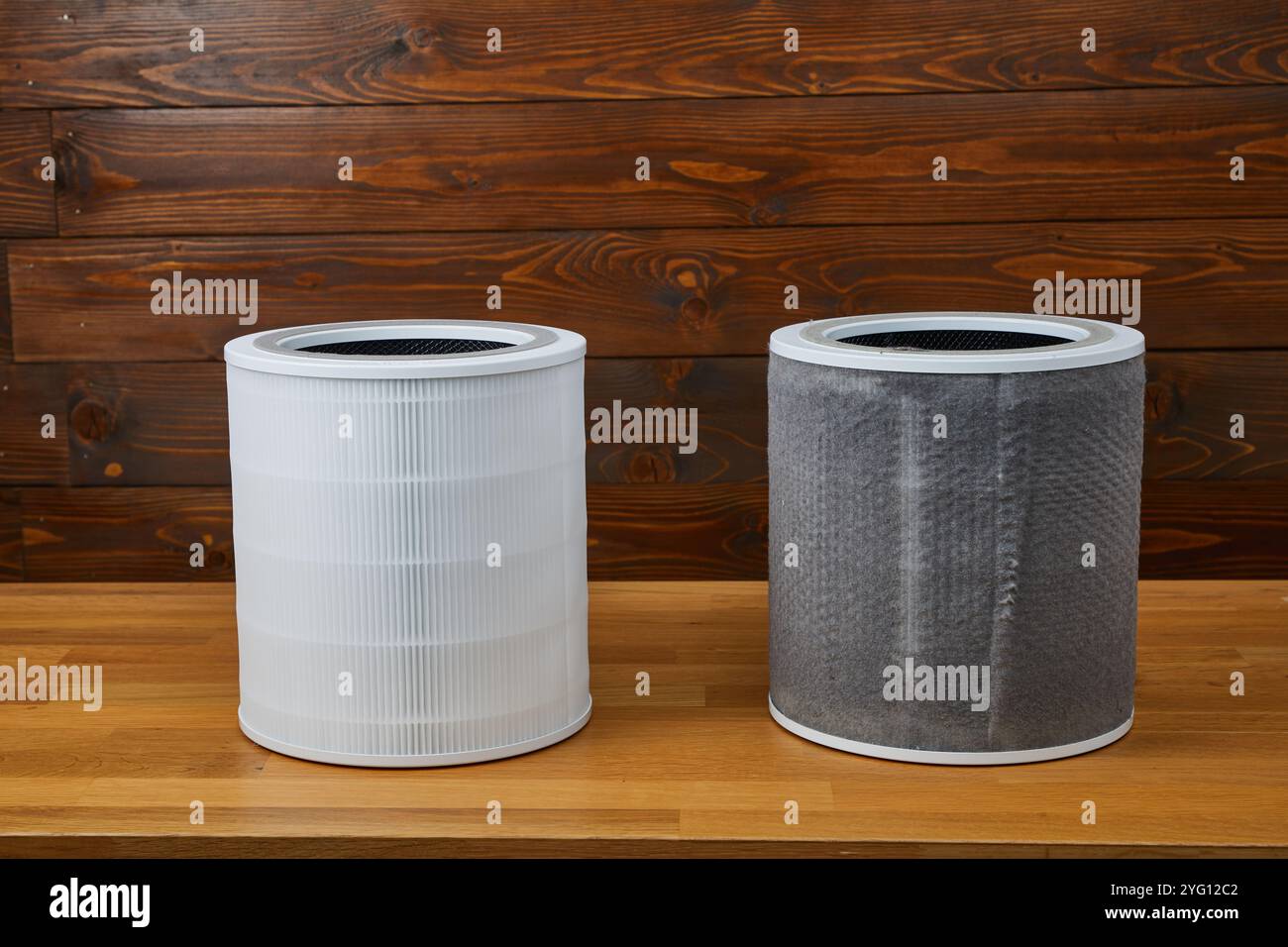 Clean and dirty air purifier filter replacement Stock Photo - Alamy