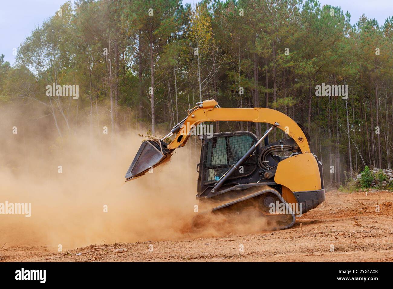 Bulldozer is leveling ground earthmoving on construction site preparing ...