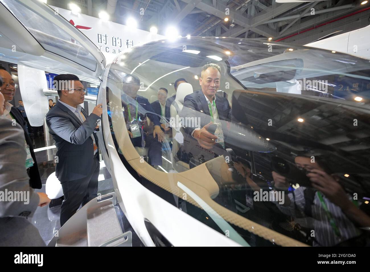 SHANGHAI, CHINA - NOVEMBER 6, 2024 - Visitors learn about the technology E20 eVTOL electric ...