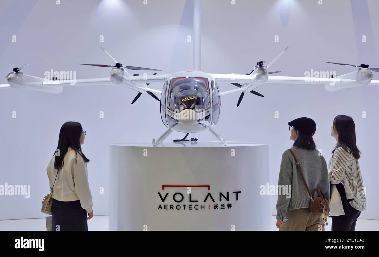 SHANGHAI, CHINA - NOVEMBER 6, 2024 - Visitors learn about Volant Air VE25 electric vertical take ...