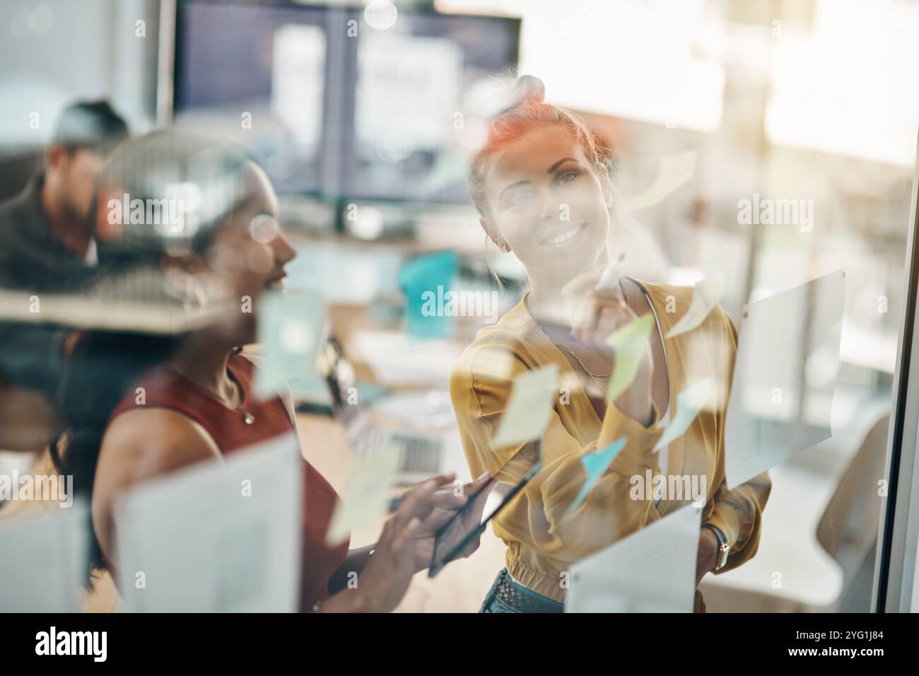 Window, collaboration and business people with sticky notes for problem ...