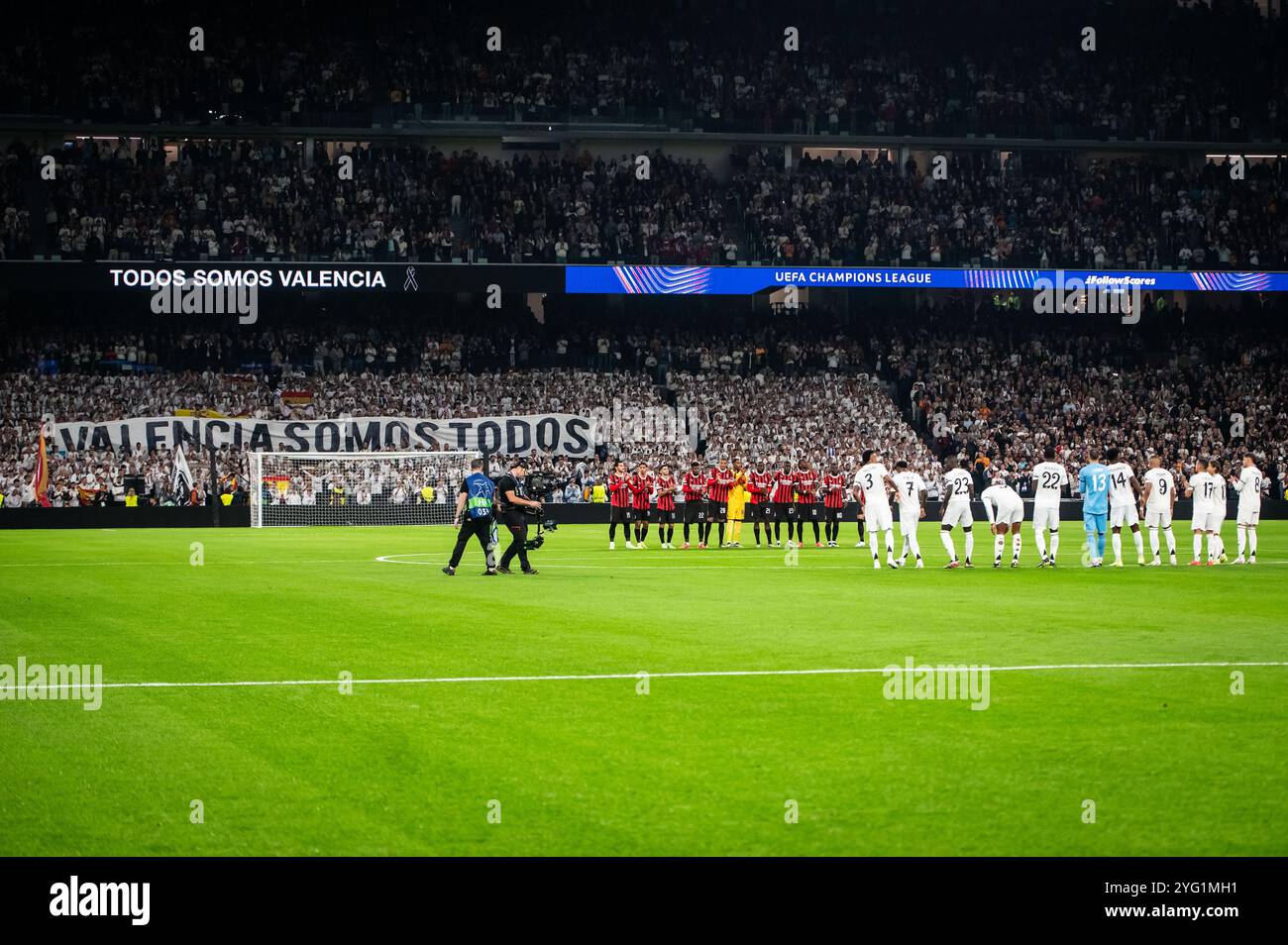Fans of Real Madrid show their support for the victims of the Valencia ...