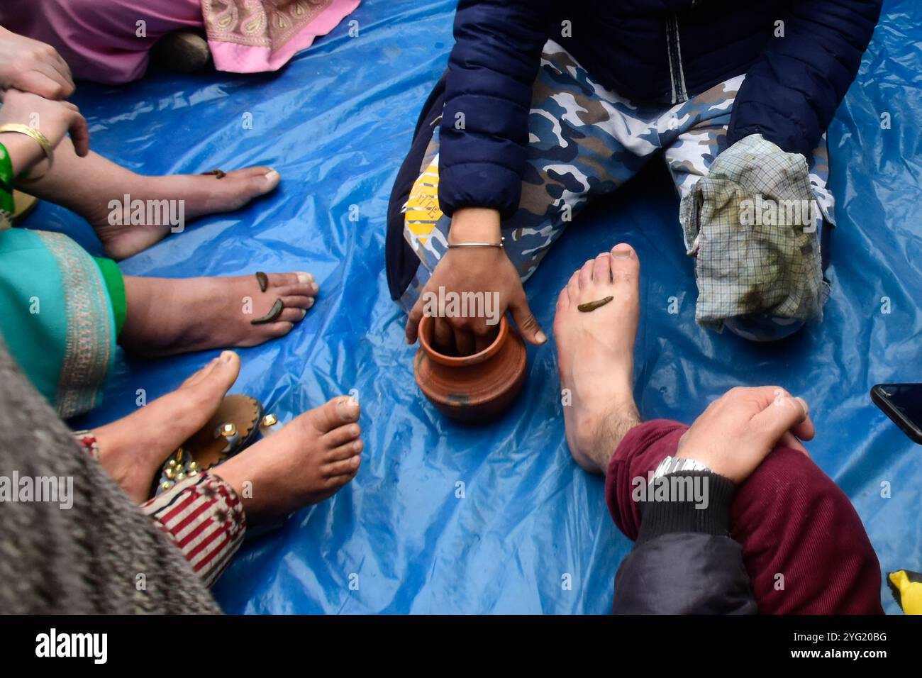 Srinagar, Kashmir. 21 March 2021. People of different ages, including ...