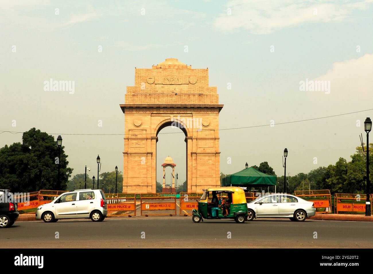 The India Gate, photographed in a foreground of road traffic in New ...