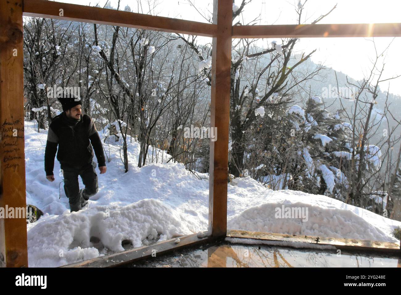 A Kashmiri boy walks on the foot hills of Zabarwan mountains afte the ...