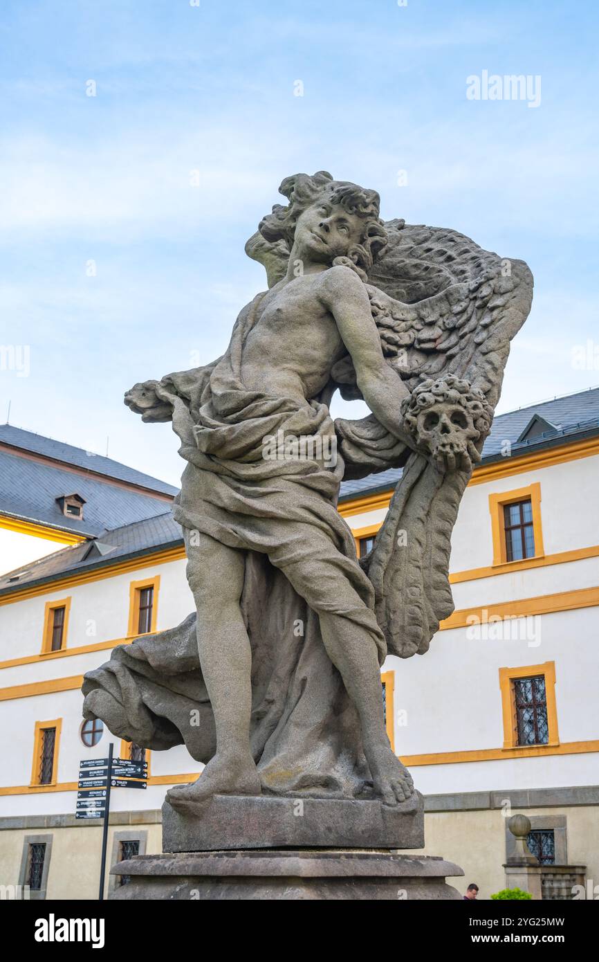 A striking Baroque statue stands prominently in the Kuks hospital ...