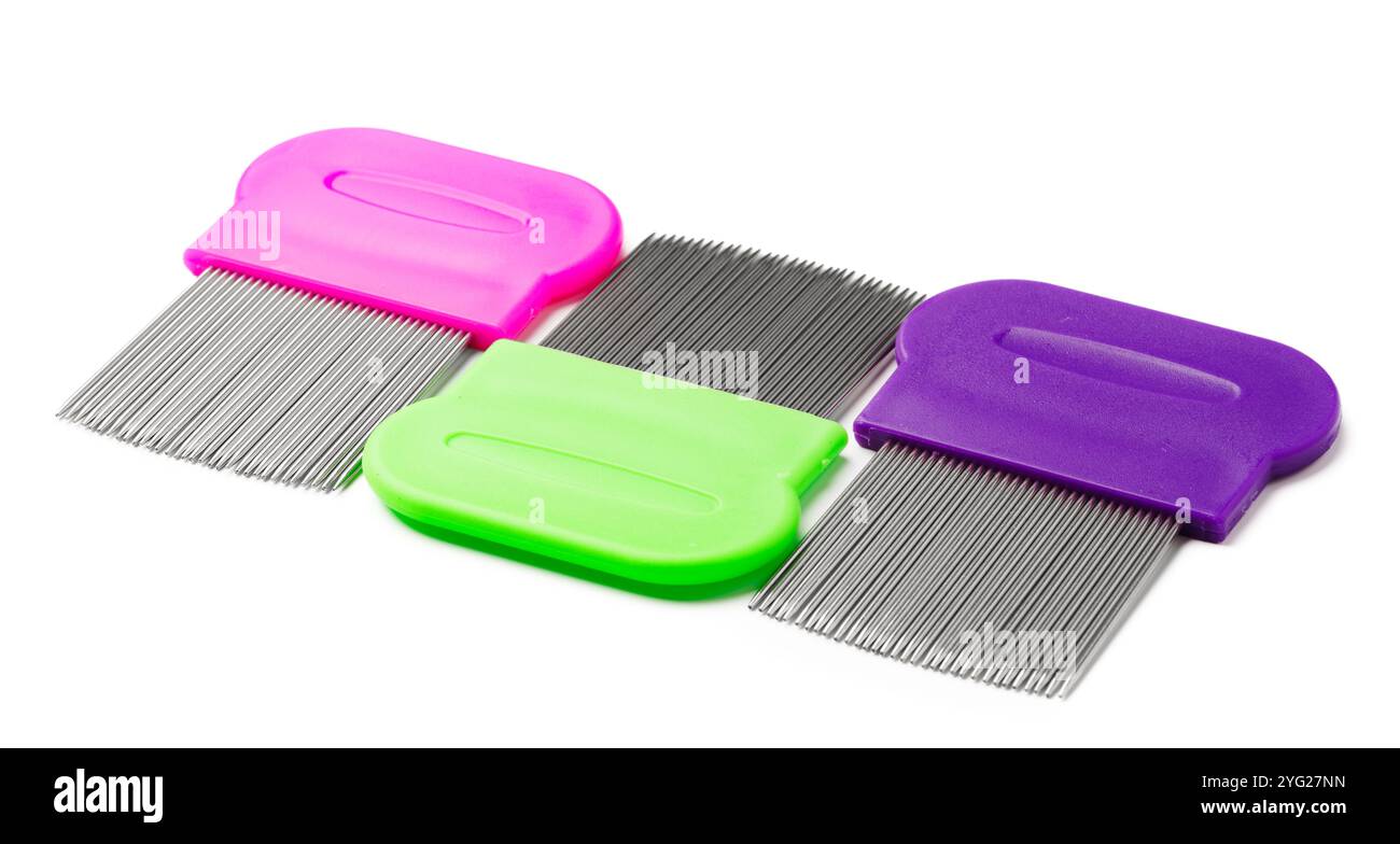 Colorful plastic and metal combs on a white background Stock Photo - Alamy