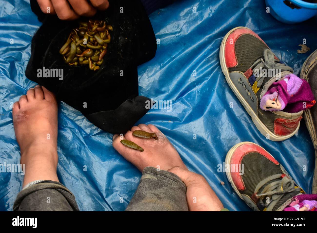 Srinagar, Kashmir. 21 March 2021. People of different ages, including ...