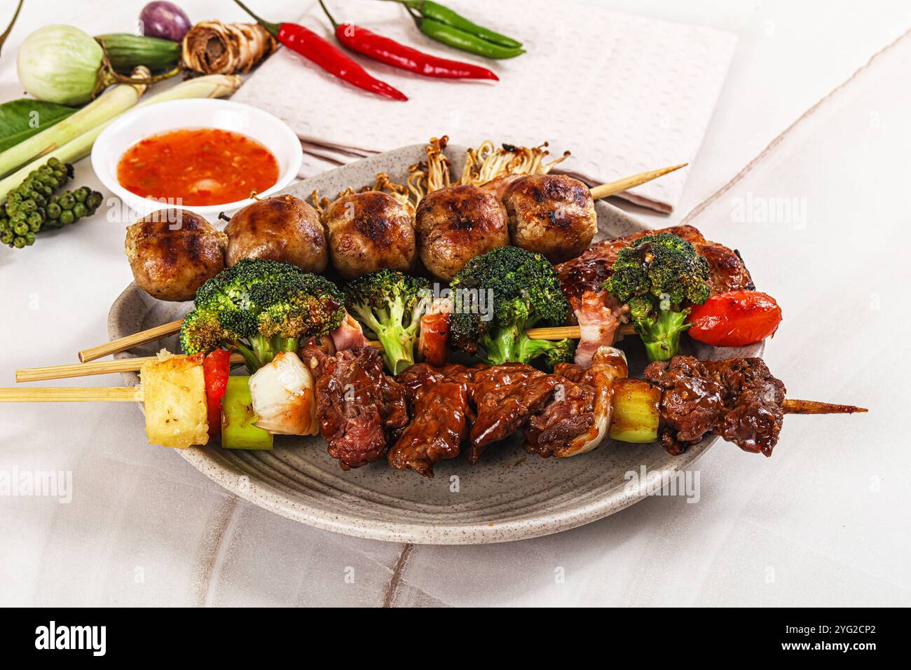 Asian grilled skewer assortment satay with beef, porl, chicken and ...