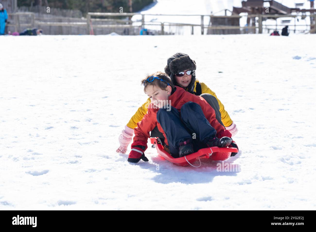 Children sled on hill hi-res stock photography and images - Alamy