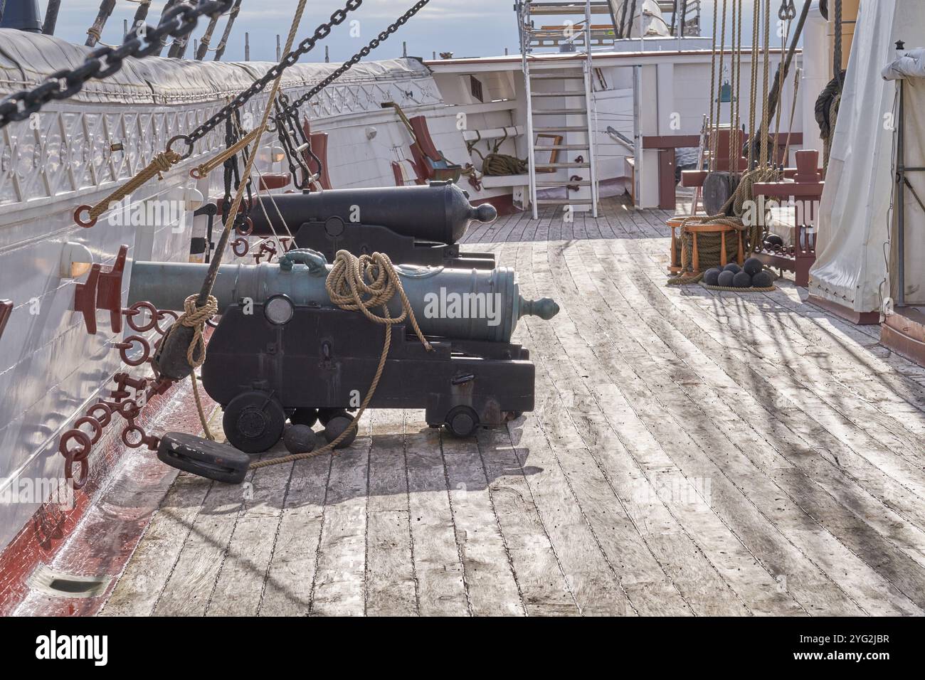 Museum, ship and cannon on deck for travel, sightseeing and landmark ...