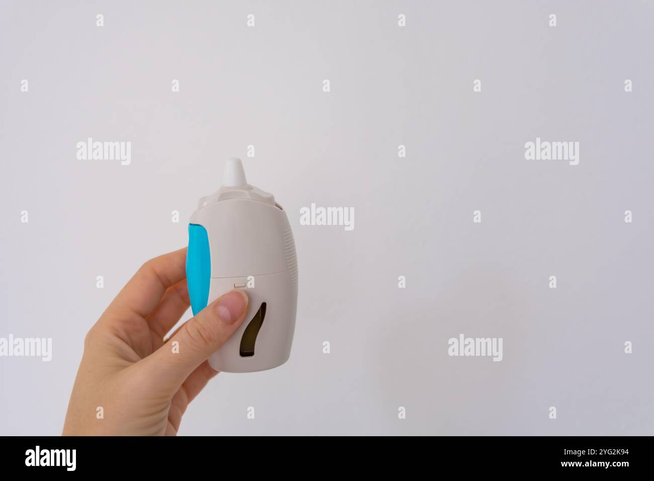 Modern nasal inhaler for respiratory health, allergy relief on white ...