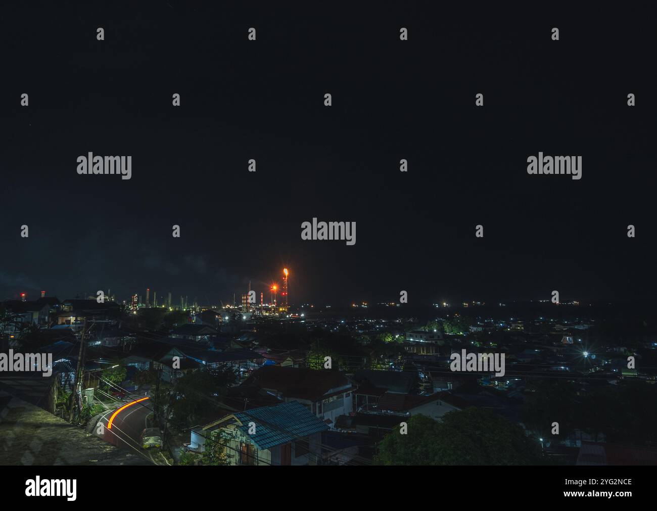 Photo of Balikpapan city refinery seen from a distance at night ...