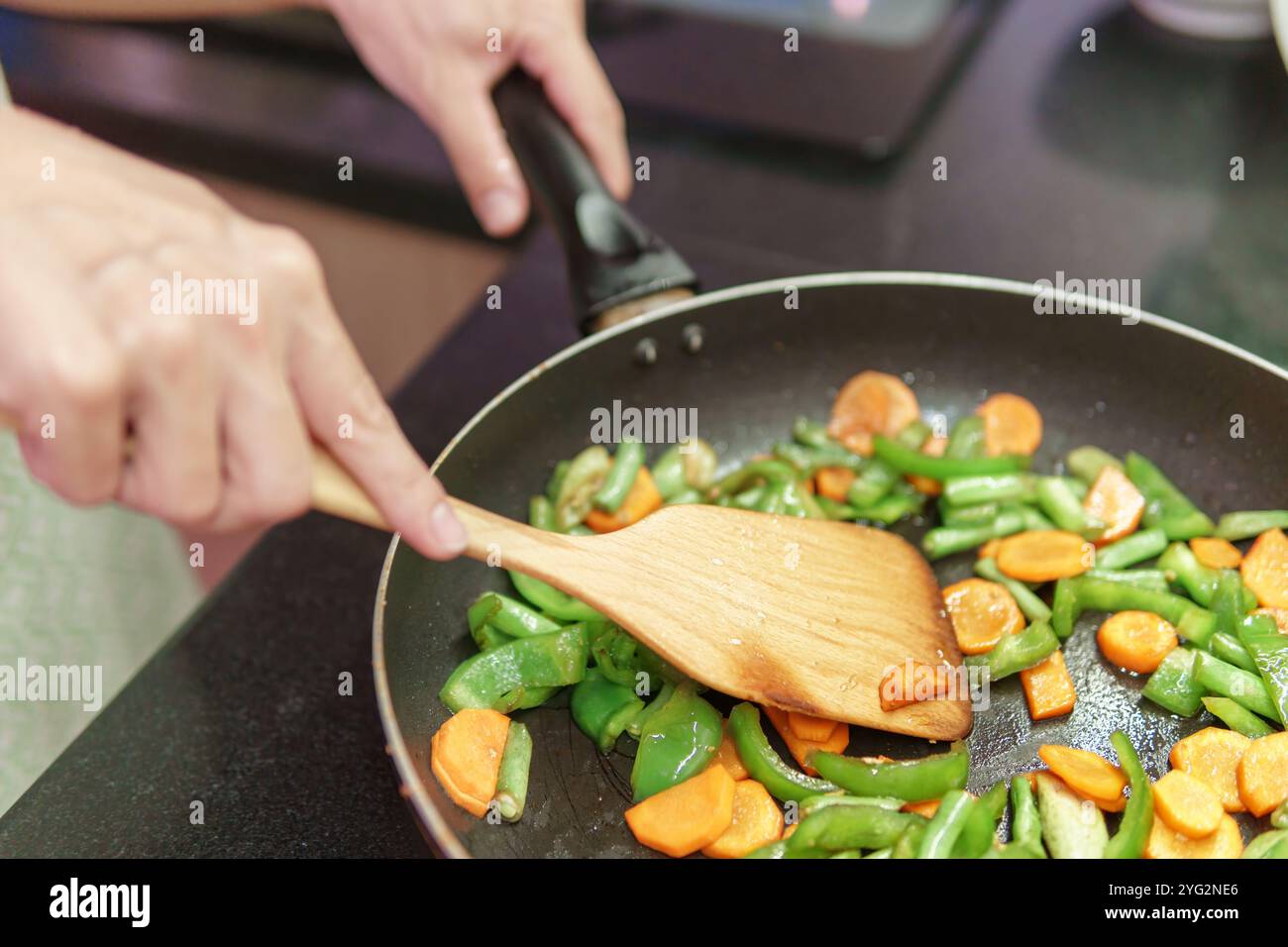 Cooking vegetables in kitchen pan hi-res stock photography and images ...