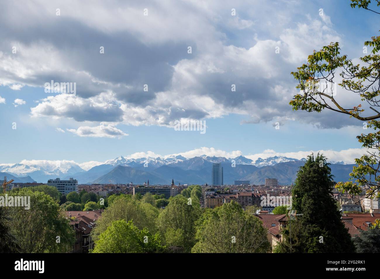 Panorama of Turin taken from above with sky, clouds and mountains in ...