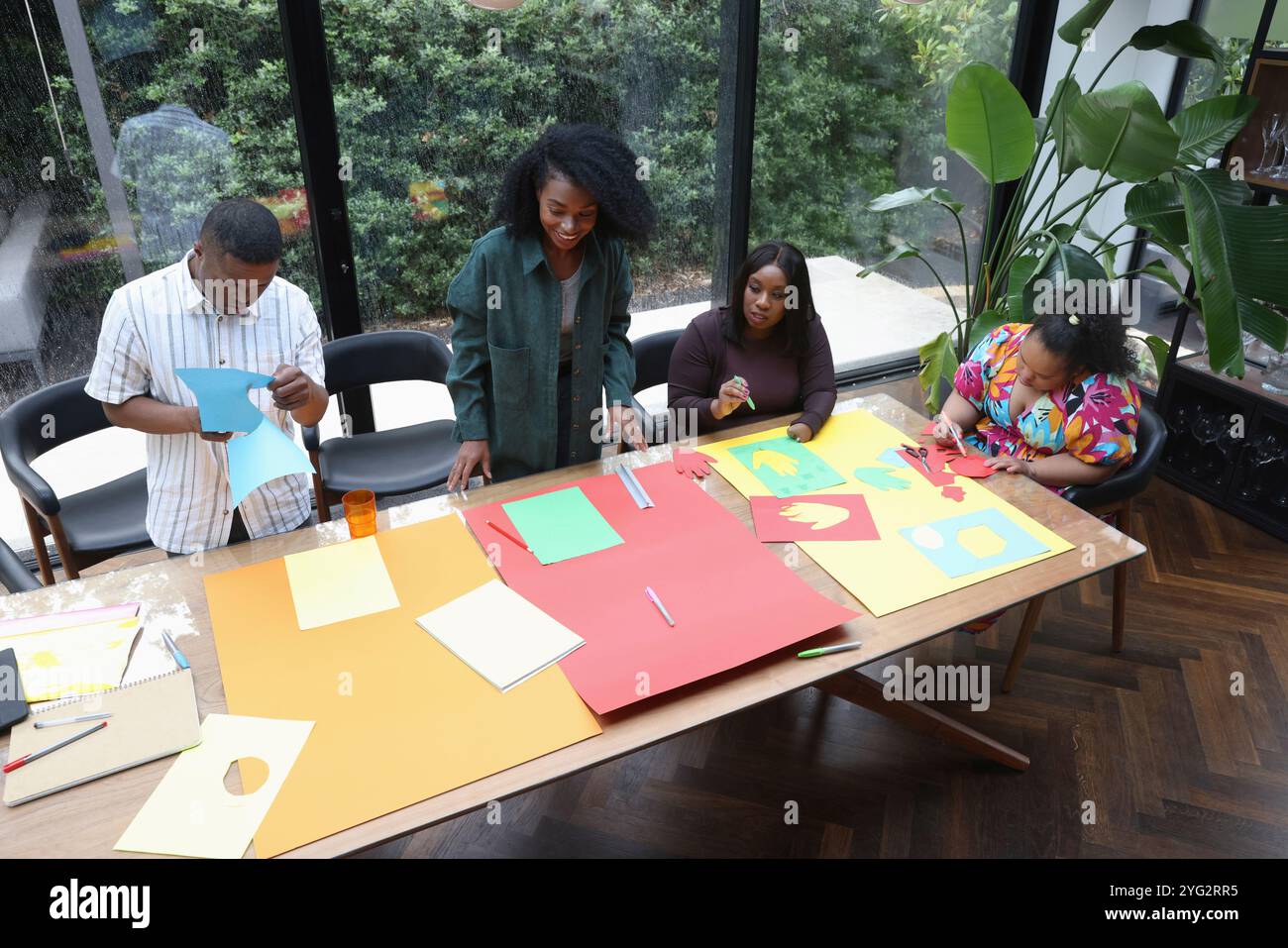 Group of people doing arts and crafts Stock Photo - Alamy