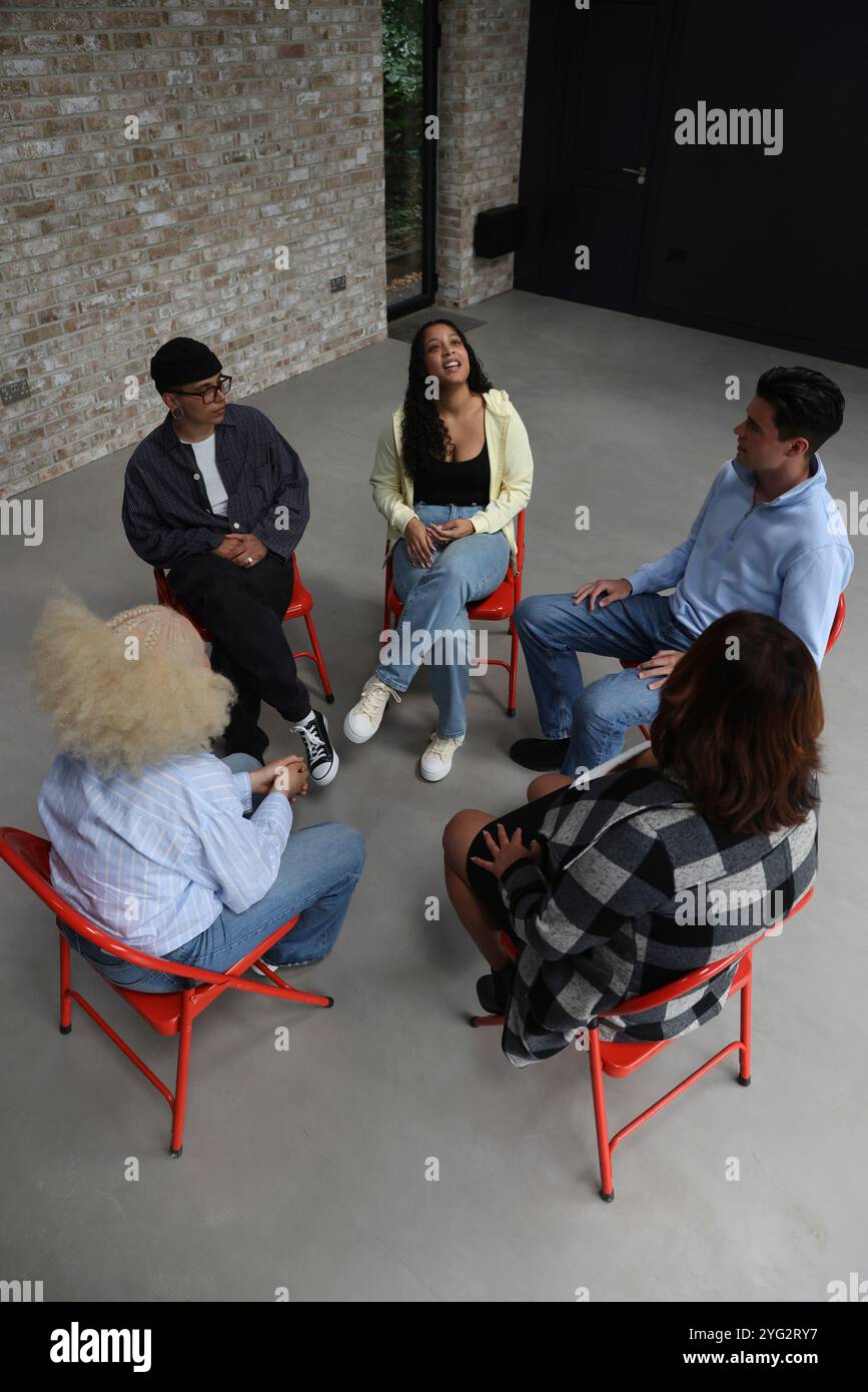 People talking during group therapy Stock Photo - Alamy