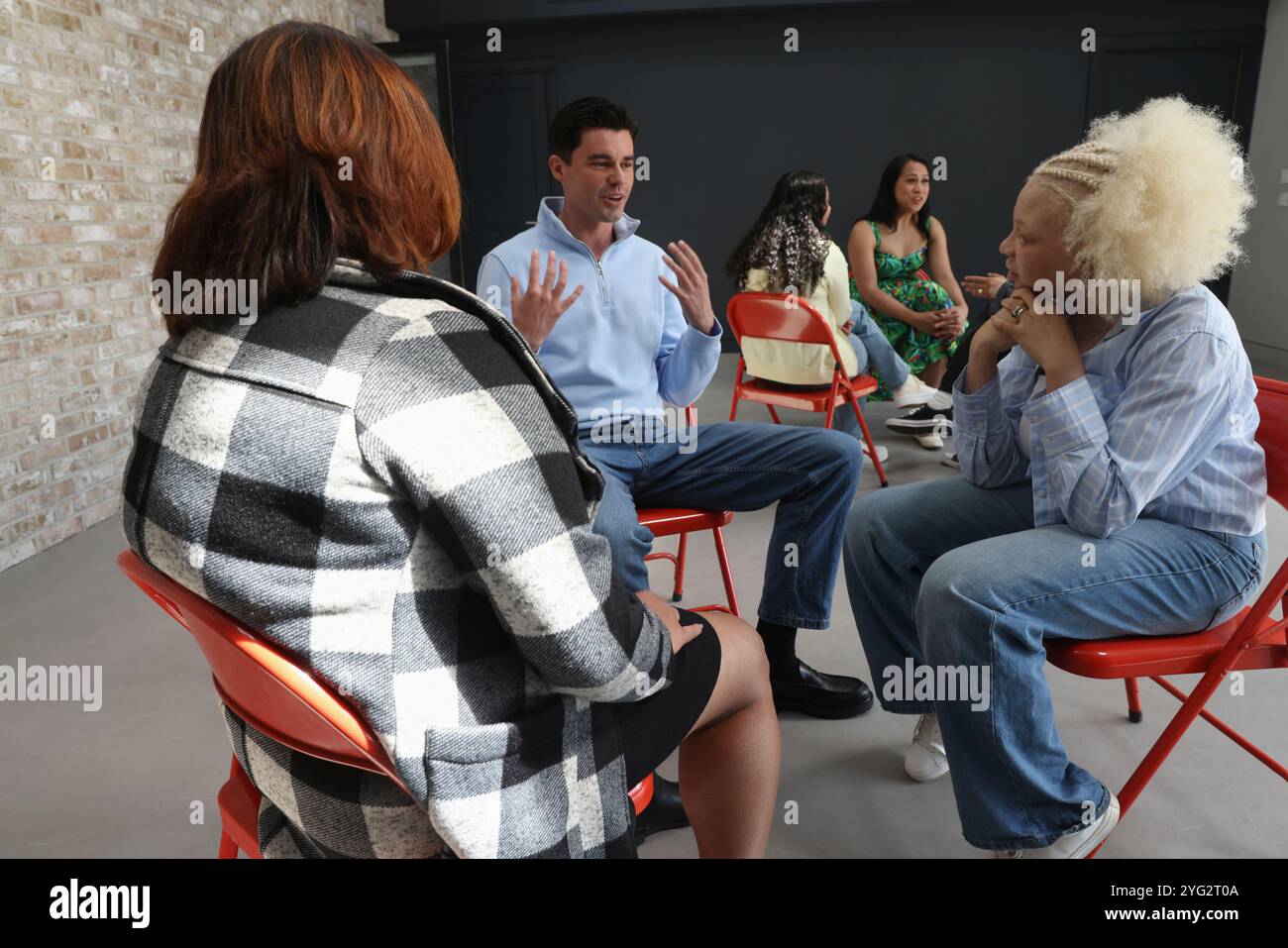 People talking during group therapy Stock Photo - Alamy