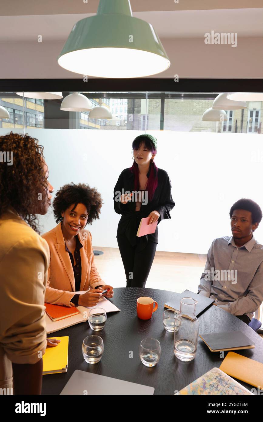 Business people sitting meeting room hi-res stock photography and ...