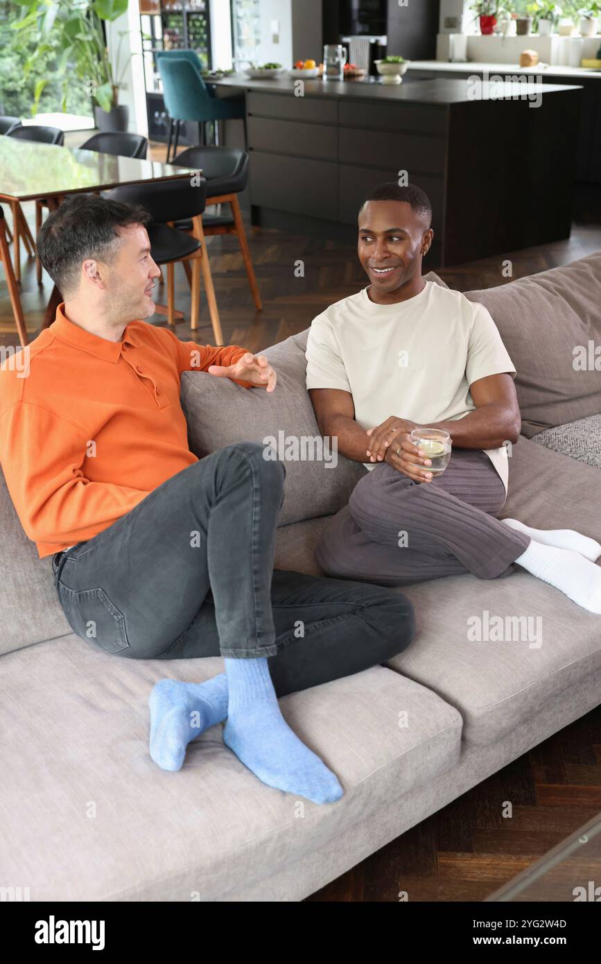 Sofa sharing hi-res stock photography and images - Alamy