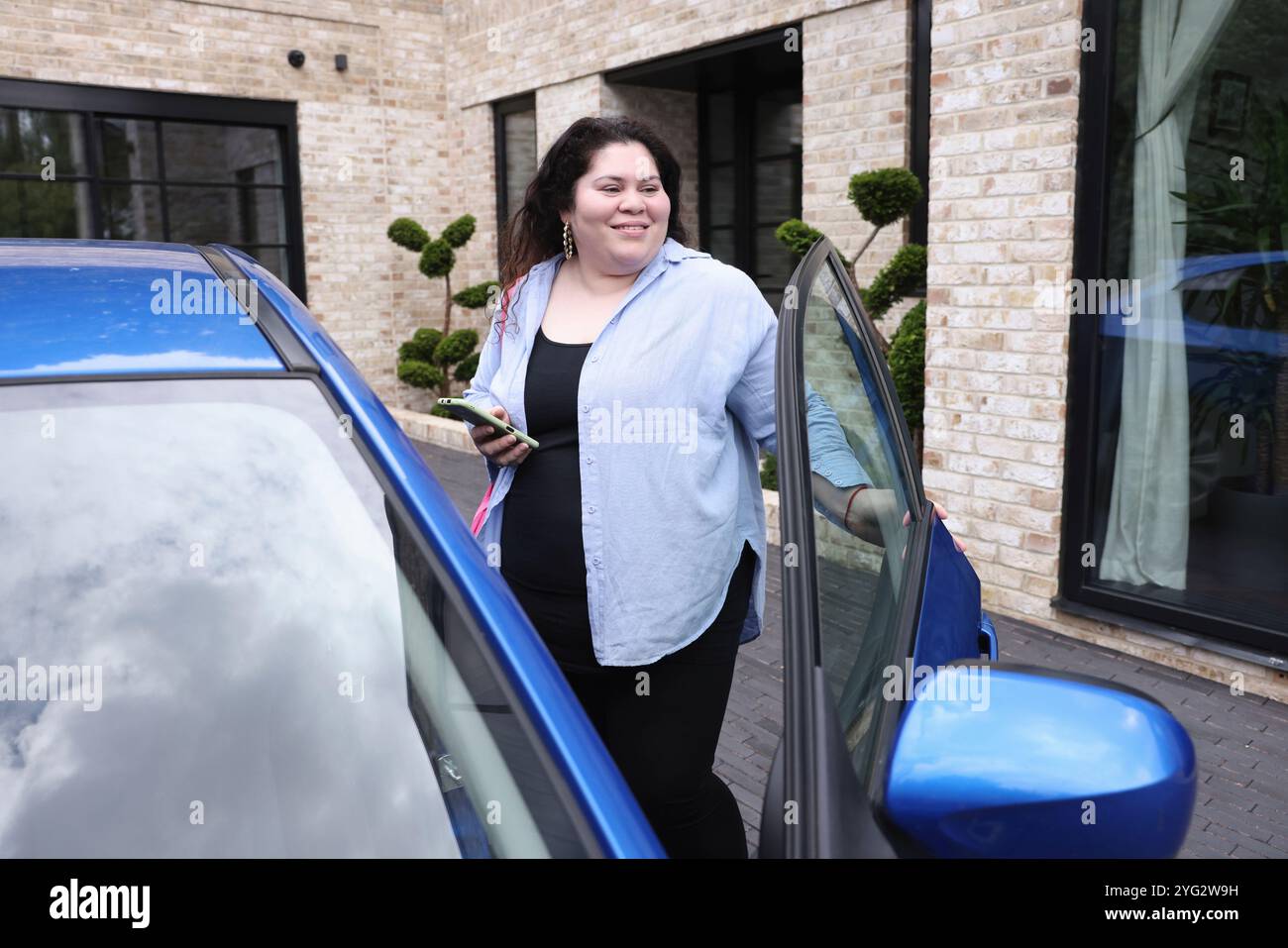 Getting into car hi-res stock photography and images - Alamy