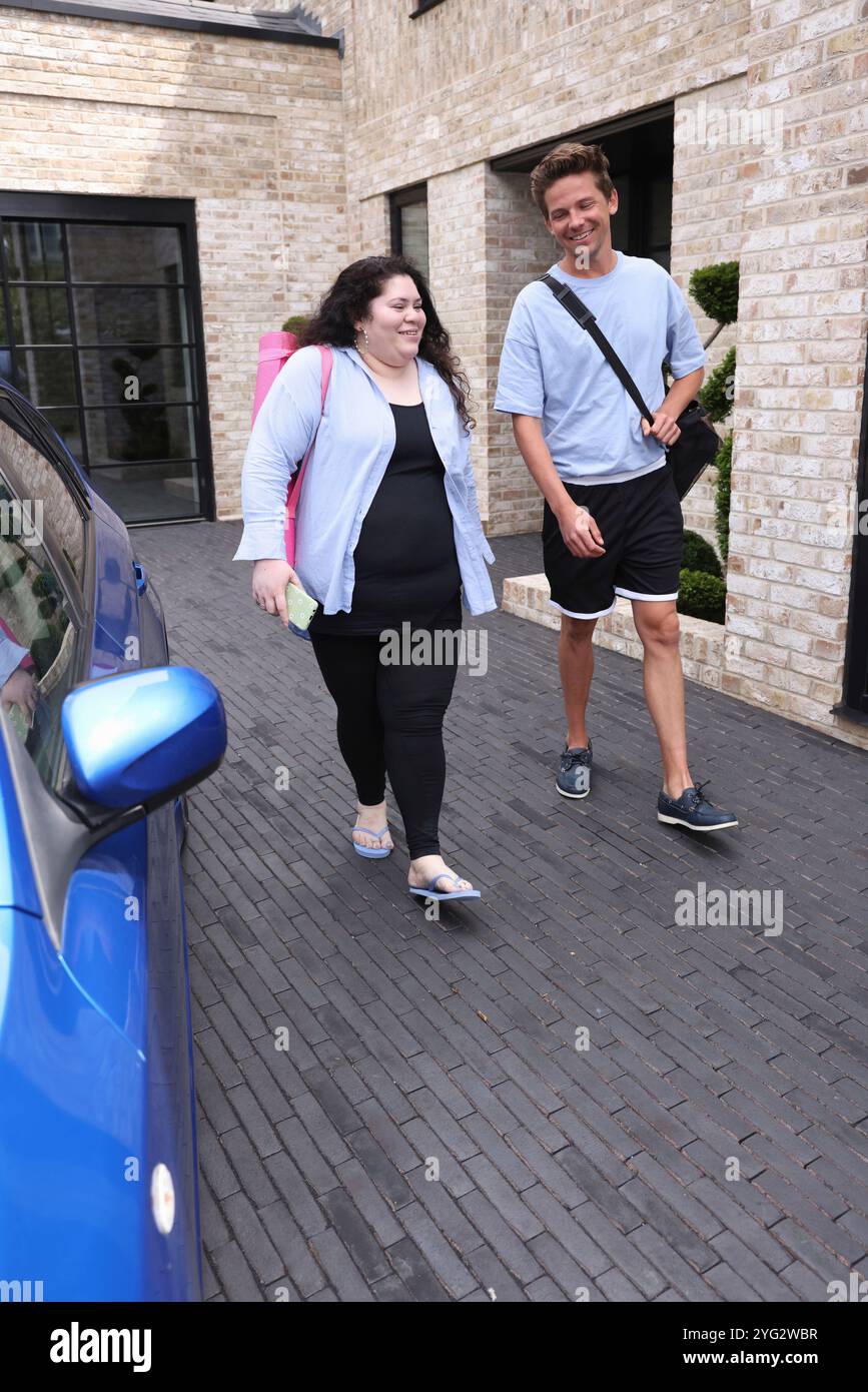 Man walking parking lot hi-res stock photography and images - Alamy