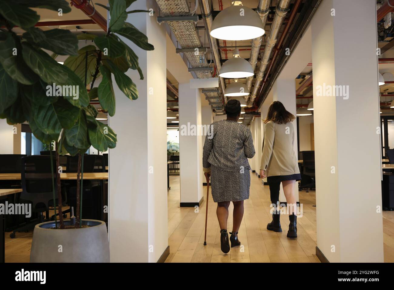 Modern walking office women hi-res stock photography and images - Alamy