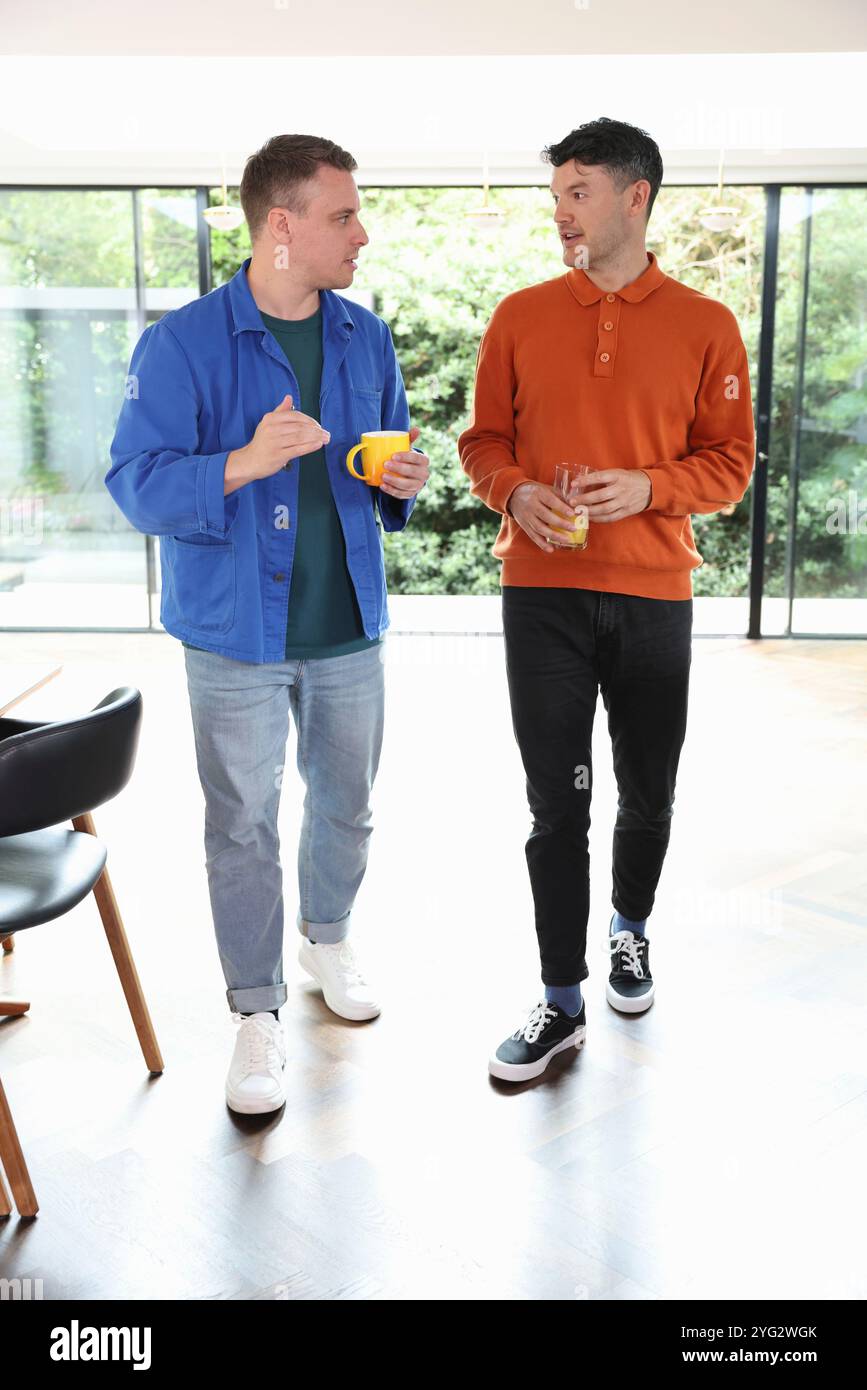 Two men in a room hi-res stock photography and images - Alamy