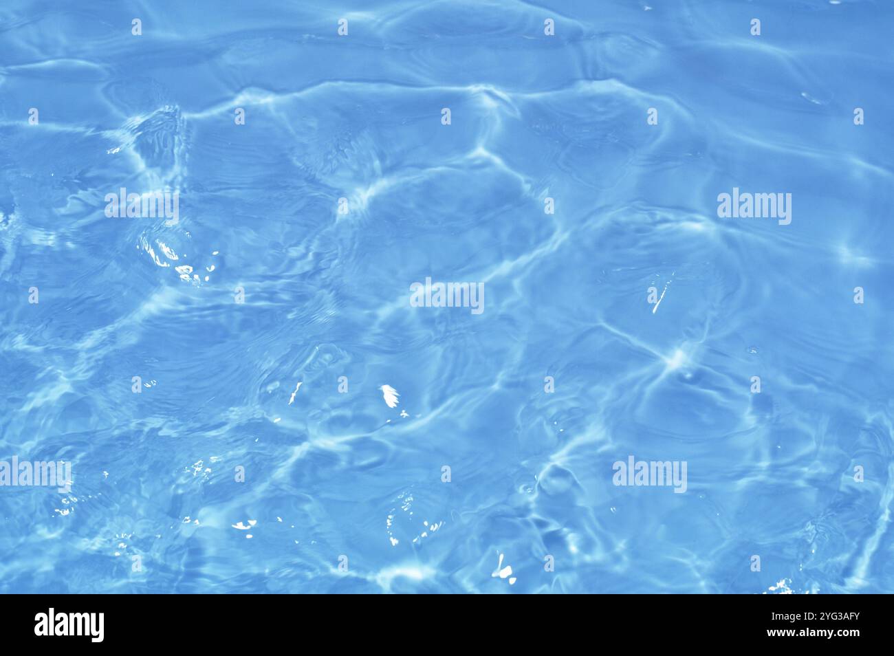 Wave pattern on shallow water surface changing with light and shadow ...