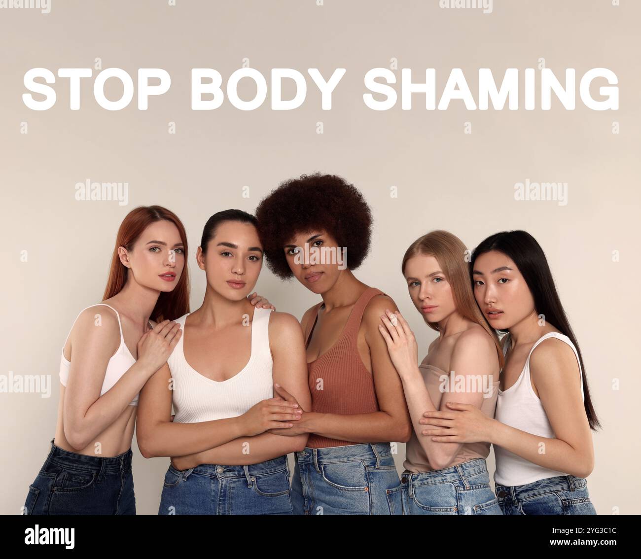 Stop body shaming. Beautiful young women on beige background Stock Photo - Alamy