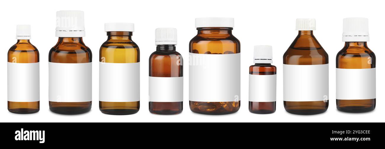 Many different glass bottles with labels isolated on white Stock Photo ...