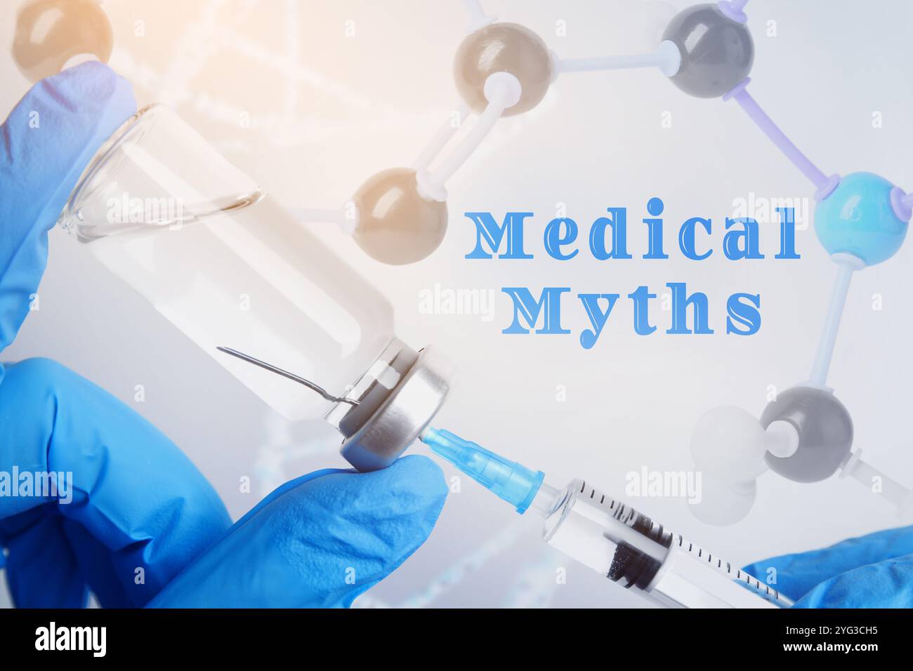 Medical myths. Doctor filling syringe with medication on light ...
