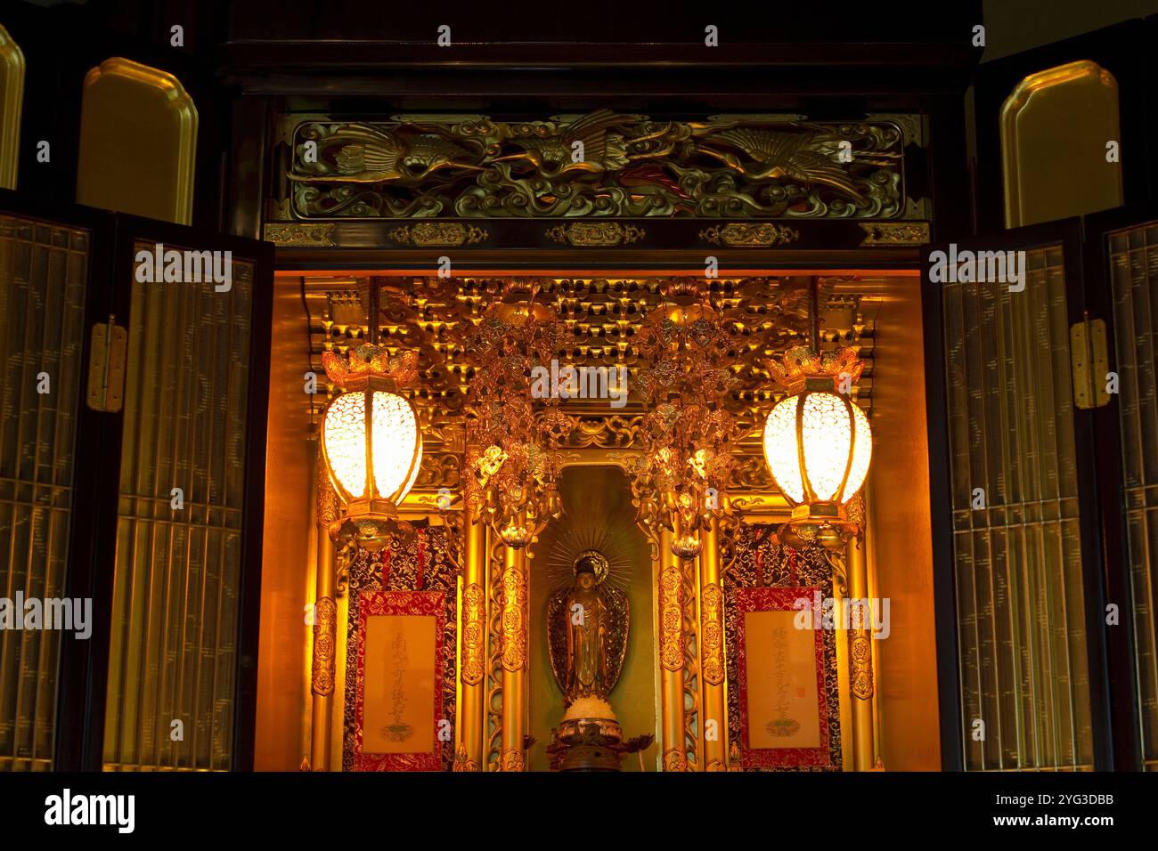 Buddhist altar in the room Stock Photo - Alamy