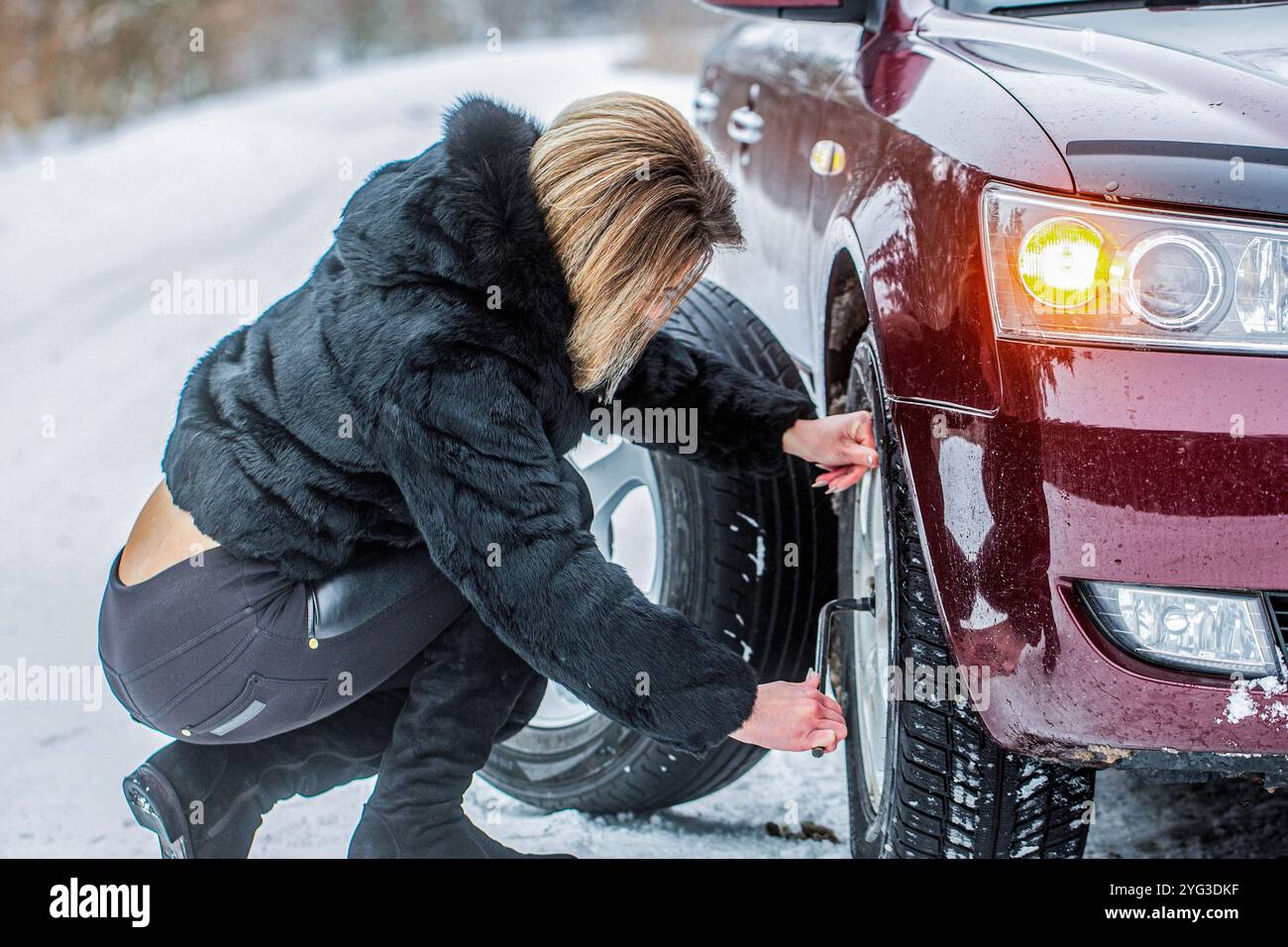 Female using changing wheel hi-res stock photography and images - Alamy