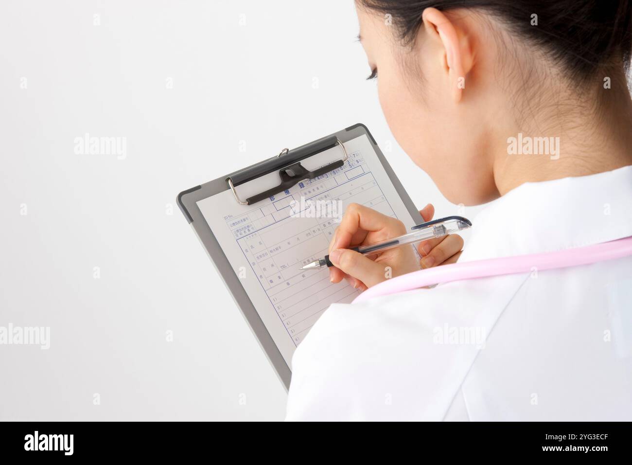 Woman writing inspection in hi-res stock photography and images - Alamy