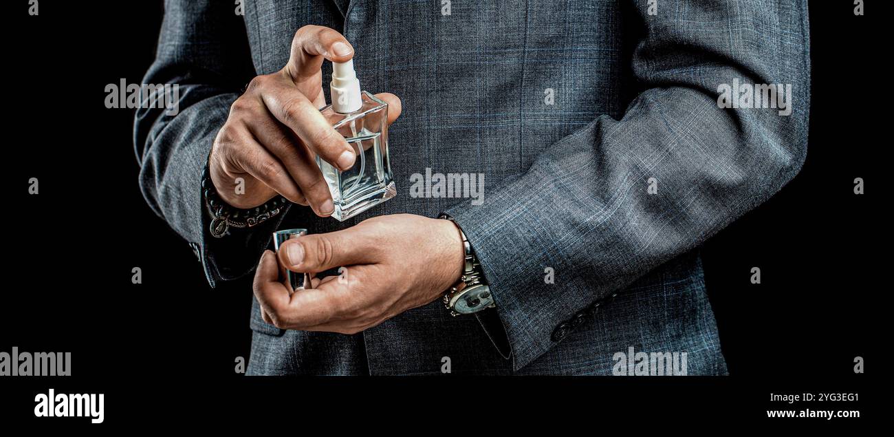 Perfume bottle men spray aroma. Male holding a perfume bottle. Man with ...