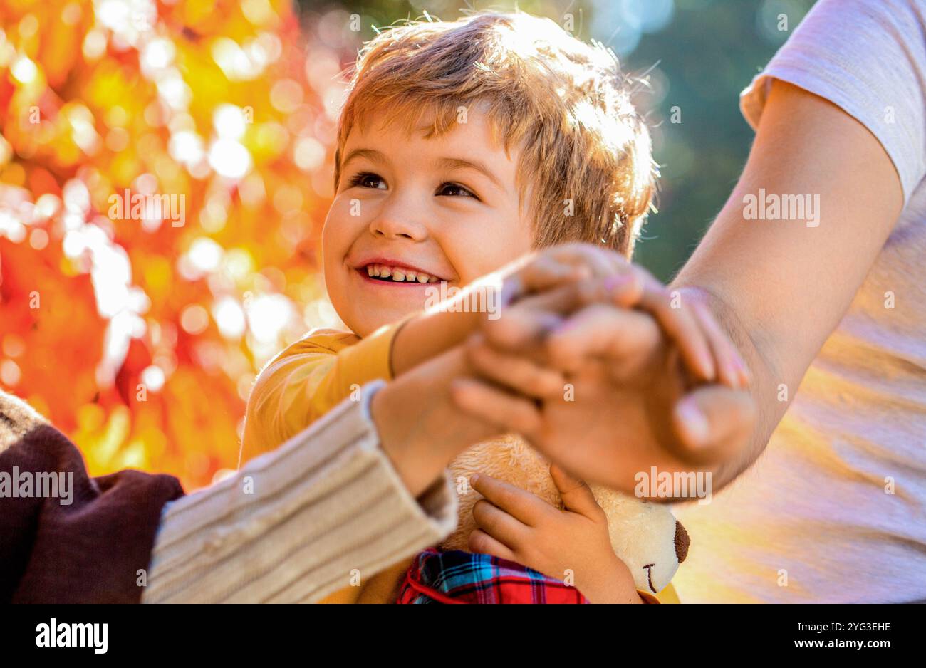 Concept of unity, support, protection, happiness. Child hand closeup ...