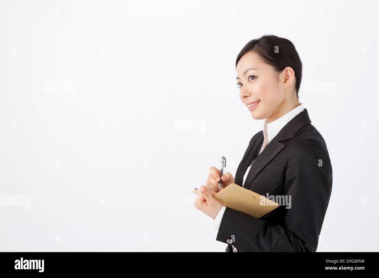 Office worker checking schedule Stock Photo - Alamy
