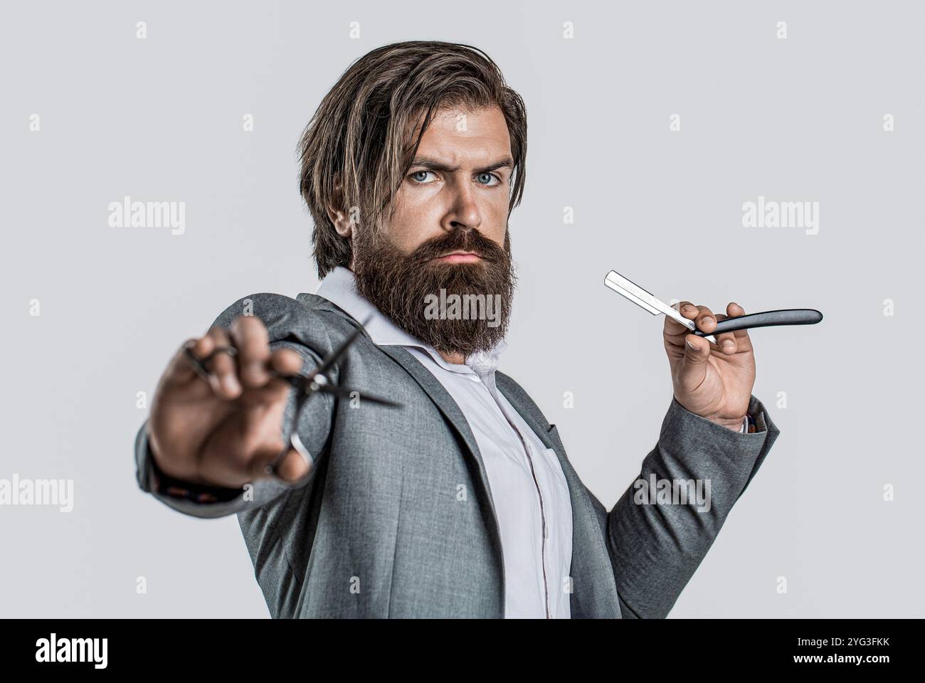 Barbershop man with scissors and retro razor blade. Handsome barbershop ...