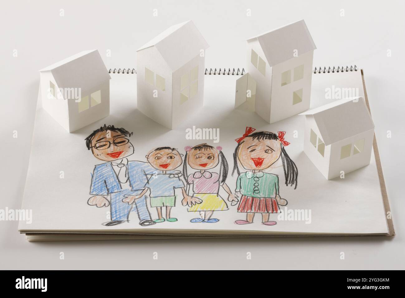 Paper craft house and family painting Stock Photo - Alamy