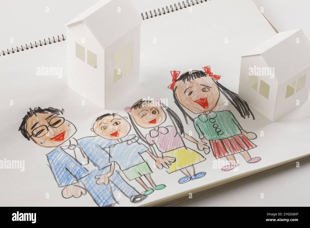 Paper craft house and family painting Stock Photo - Alamy