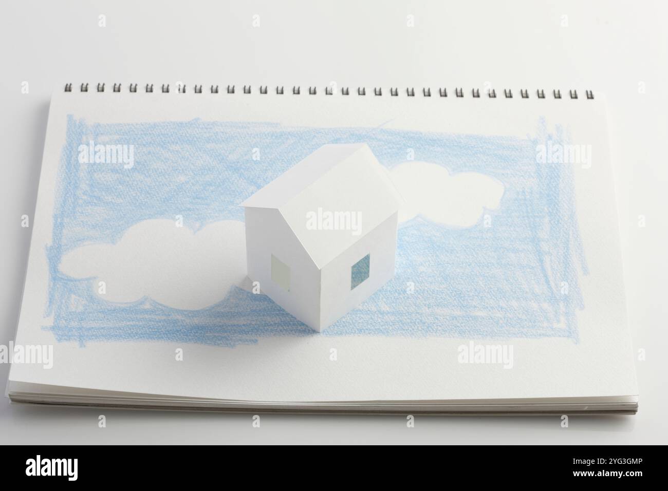 Papercraft house and illustration blue sky Stock Photo - Alamy