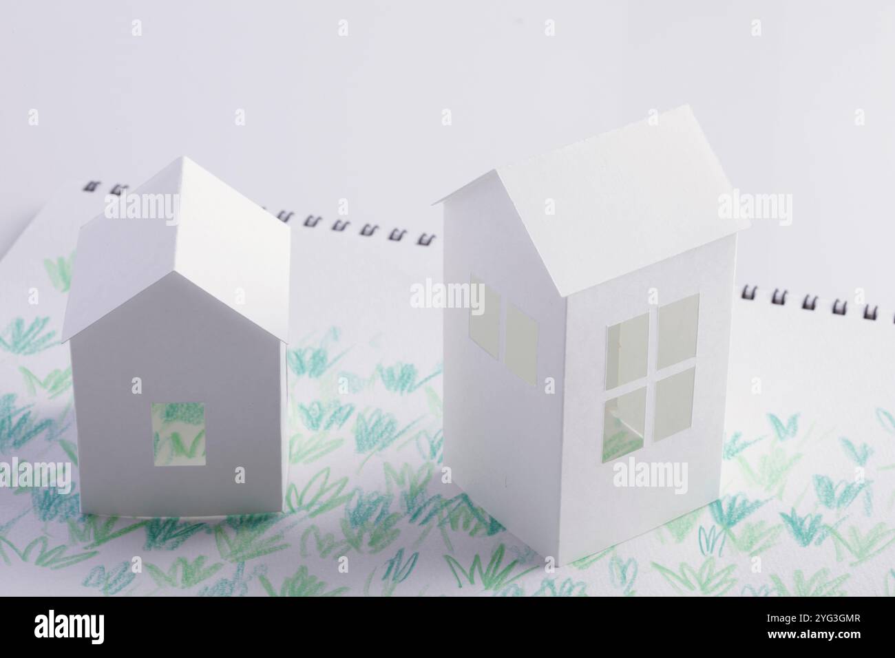 Paper craft house and illustration lawn Stock Photo - Alamy