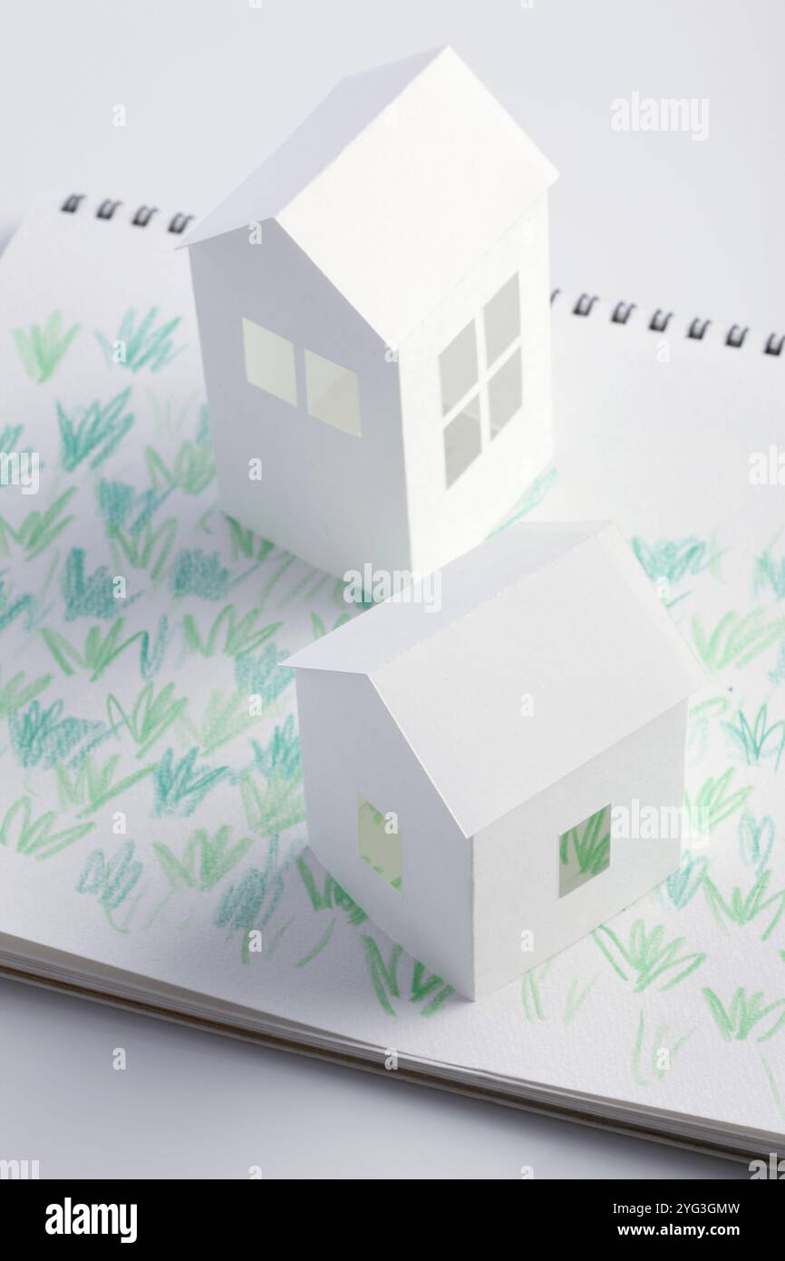 Paper craft house and illustration lawn Stock Photo - Alamy