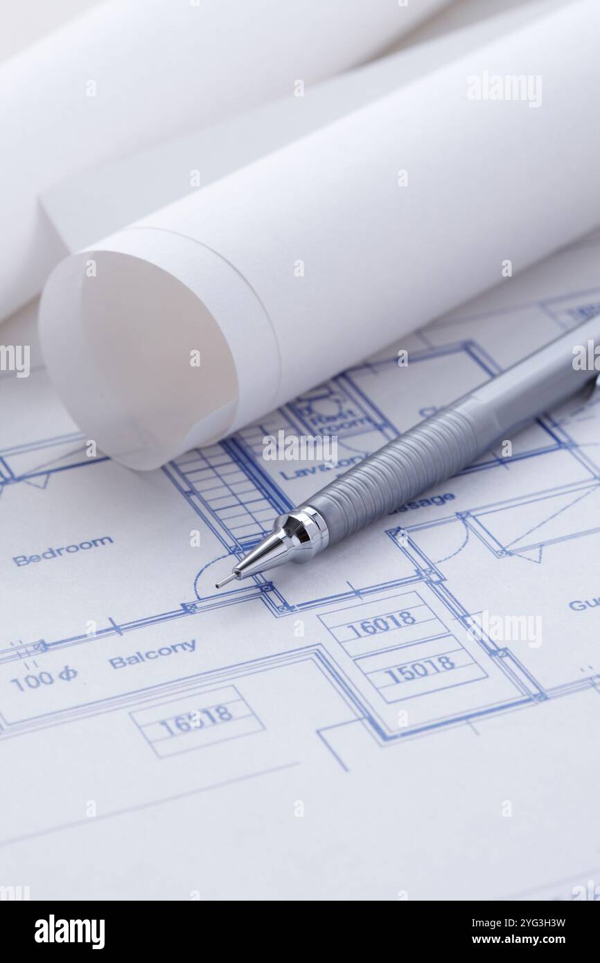 Blueprints and pens Stock Photo - Alamy